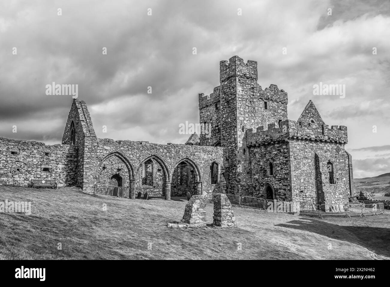 The image is of the 12th century historic Peel Castle Abbey on the west ...