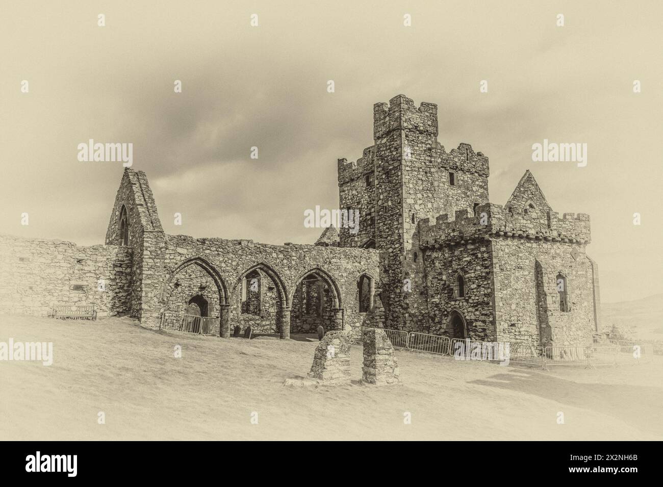 The image is of the 12th century historic Peel Castle Abbey on the west ...