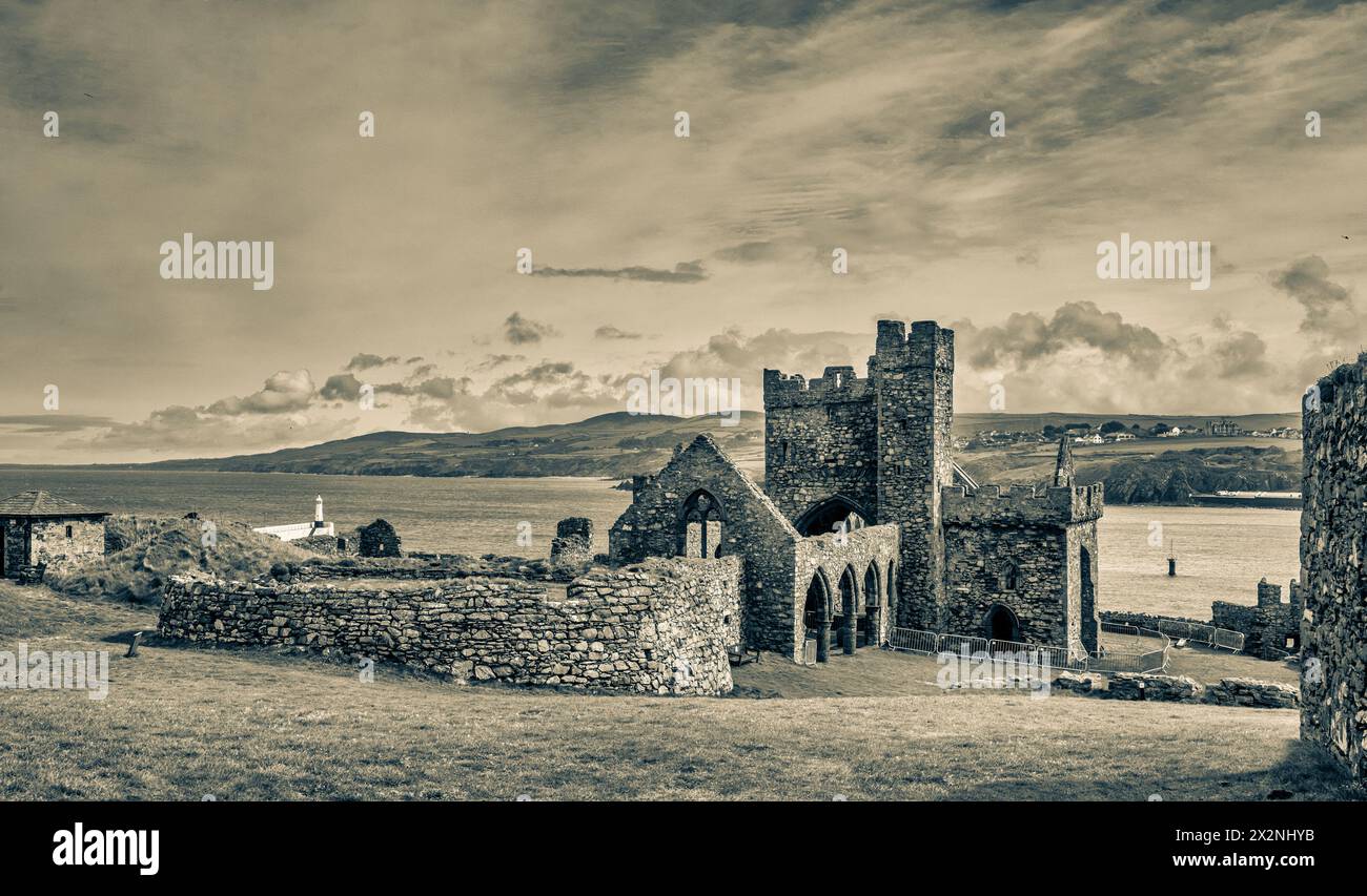 The image is of the 12th century historic Peel Castle Abbey on the west ...
