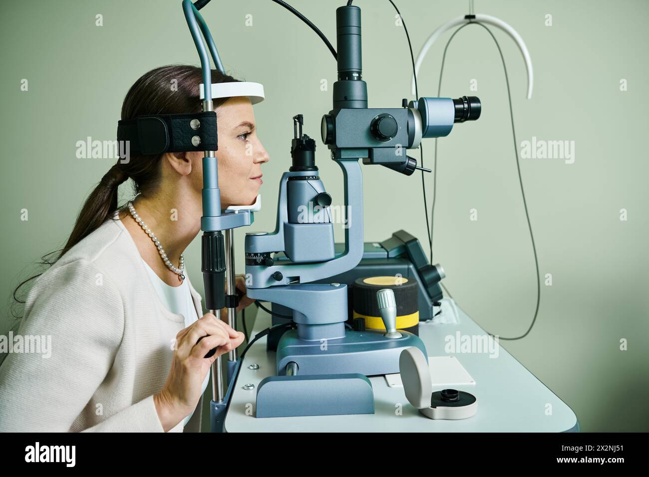 Female patient checking her vision Stock Photo - Alamy