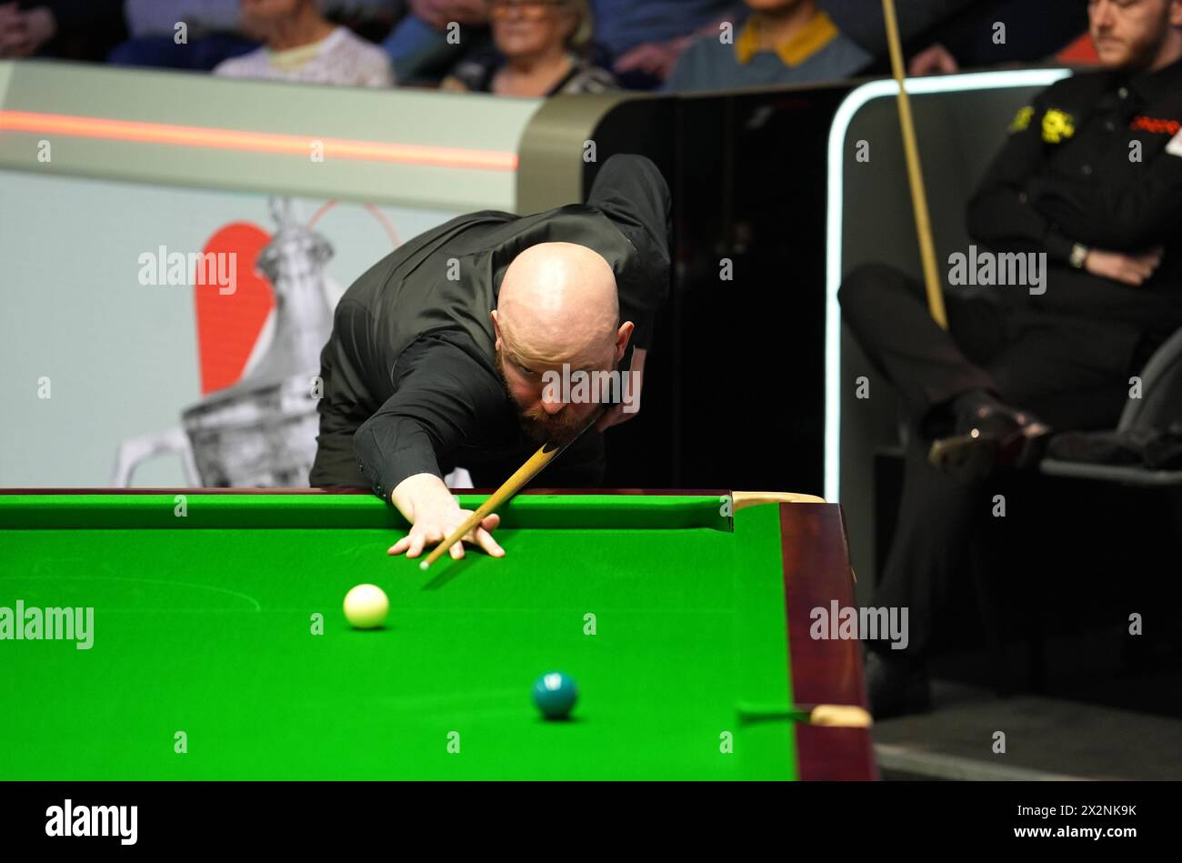 Robbie Williams in action against Mark Allen on day four of the 2024 ...