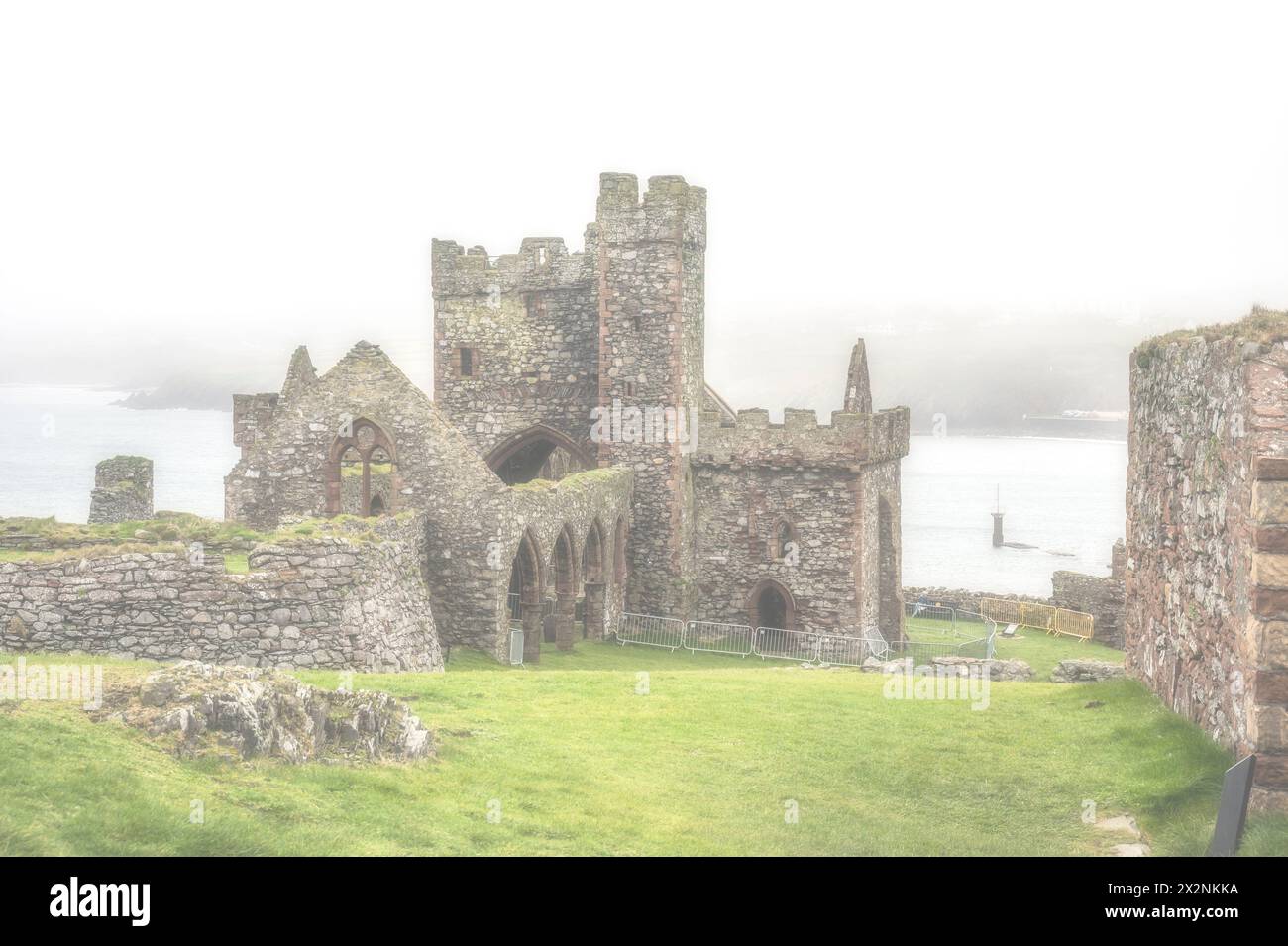 The image is of the 12th century historic Peel Castle Abbey on the west ...
