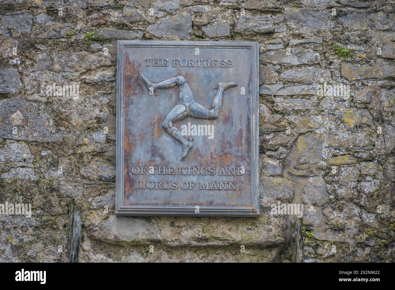 The image is of the Three Legged heraldic Manx symbol at the 12th ...