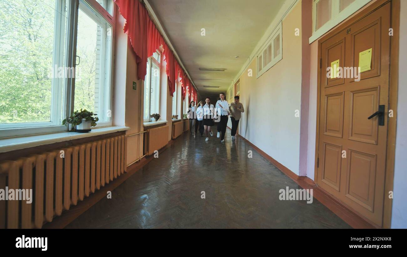 The students are running down the hallway of the school Stock Photo - Alamy