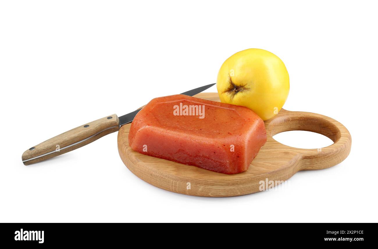 Delicious sweet quince paste, knife and fresh fruit isolated on white ...