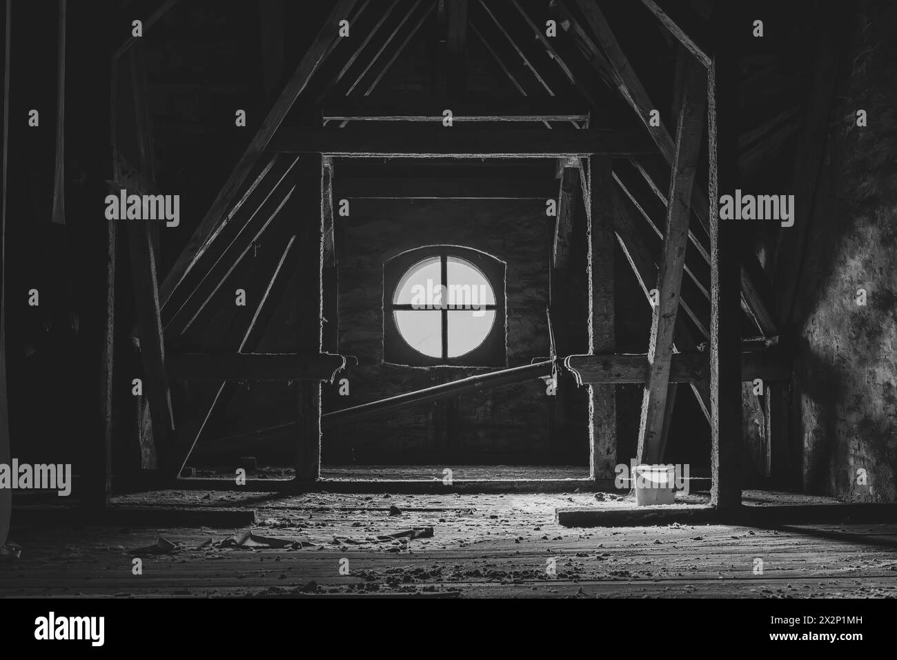 An old attic with a round window, roof truss, round window, old and ...