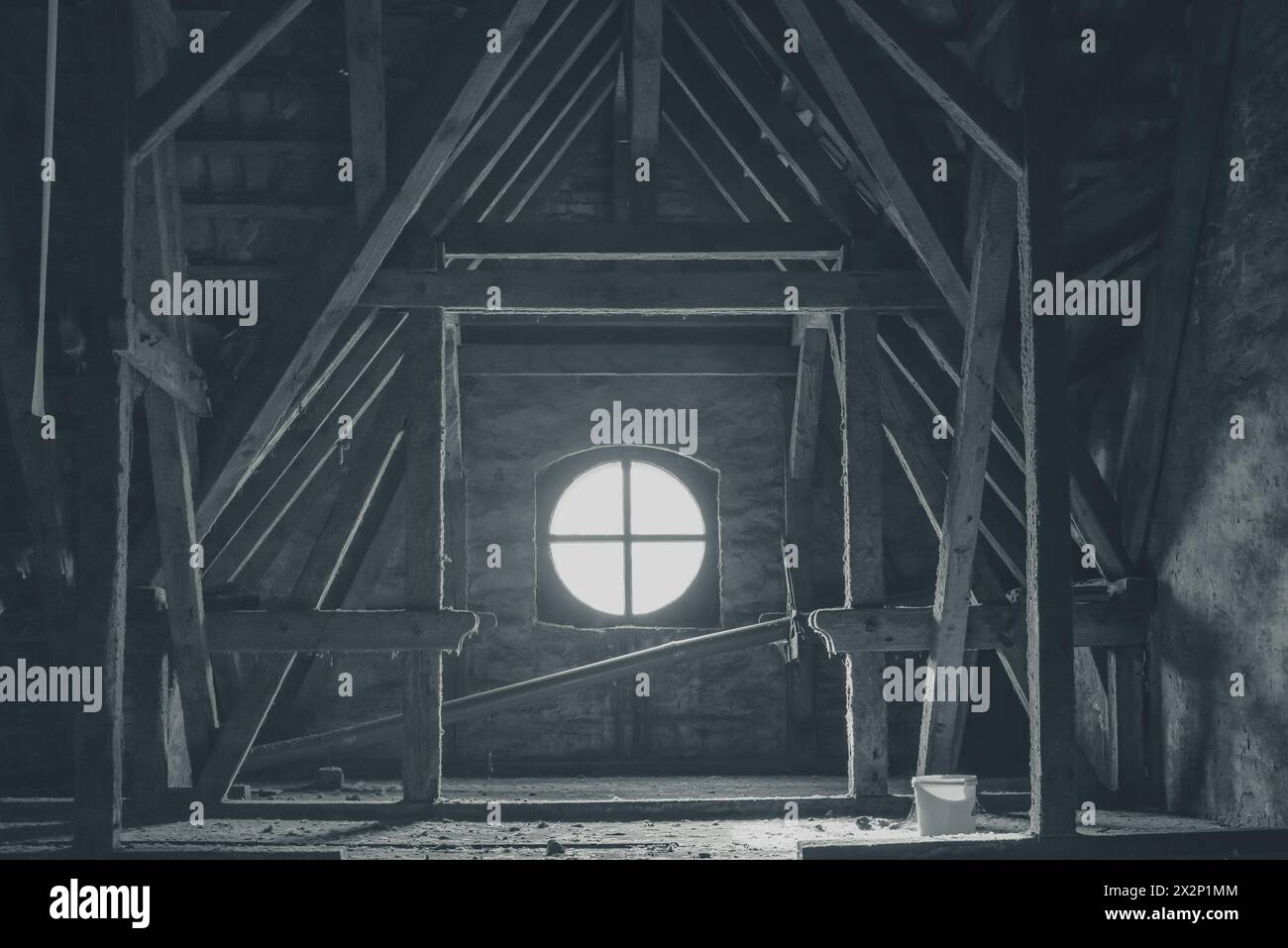 An old attic with a round window, roof truss, round window, old and ...