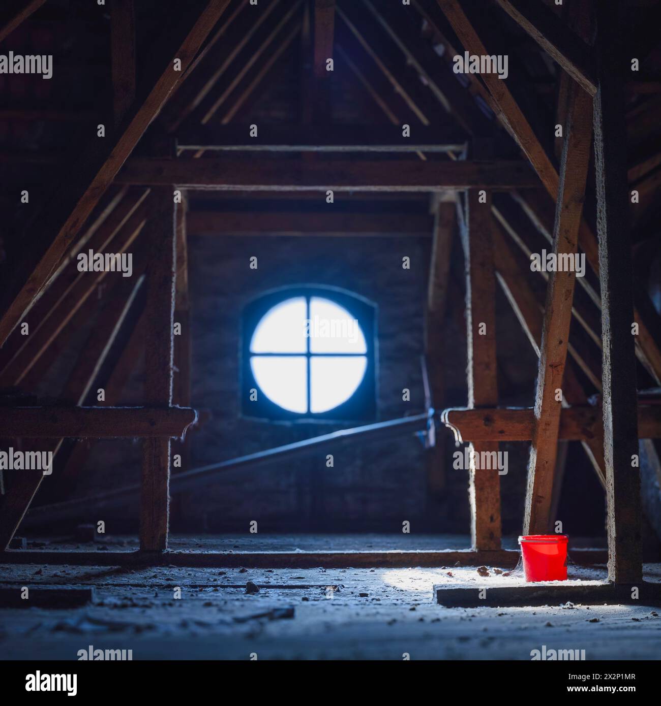 An old attic with a round window, roof truss, round window, old and ...