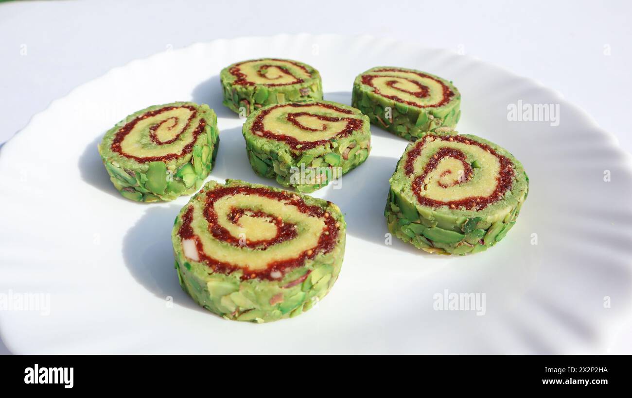 Tasty Sweets Pista anjeer roll decorated with chopped pistachio and ...