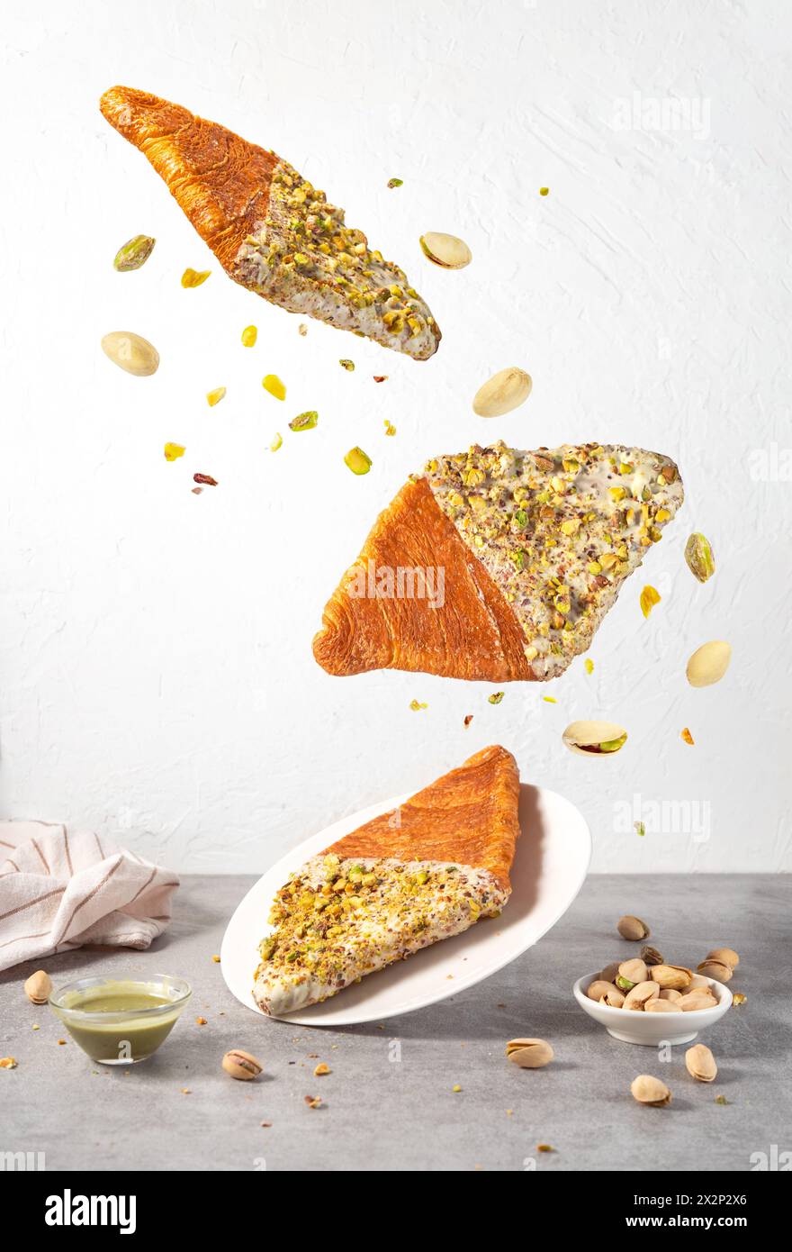 Flat Croissants Flying, Trendy Pastry, Croissants with Pistachio Glaze ...