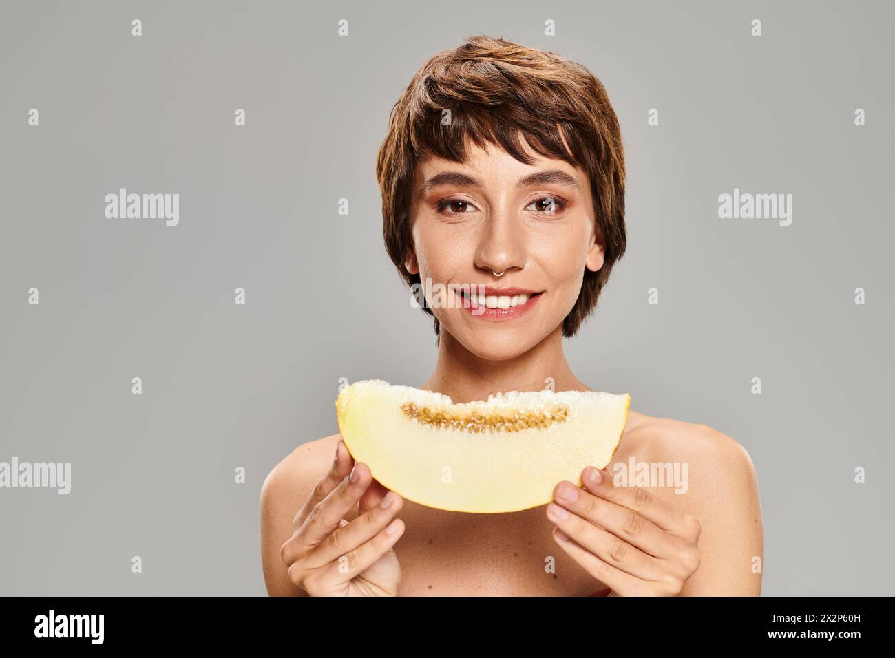 Beautiful young woman hides hi-res stock photography and images - Alamy