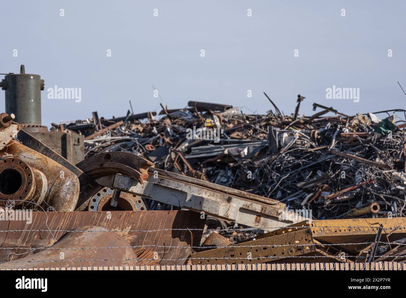 Junk yard for metal recycling with pile of scrap metal Stock Photo - Alamy