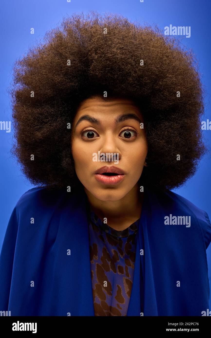 Stylish African American woman with curly hairdomaking comical ...