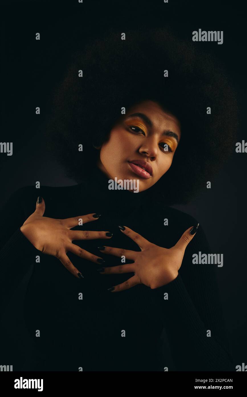 Holding her hands on her chest hi-res stock photography and images - Alamy