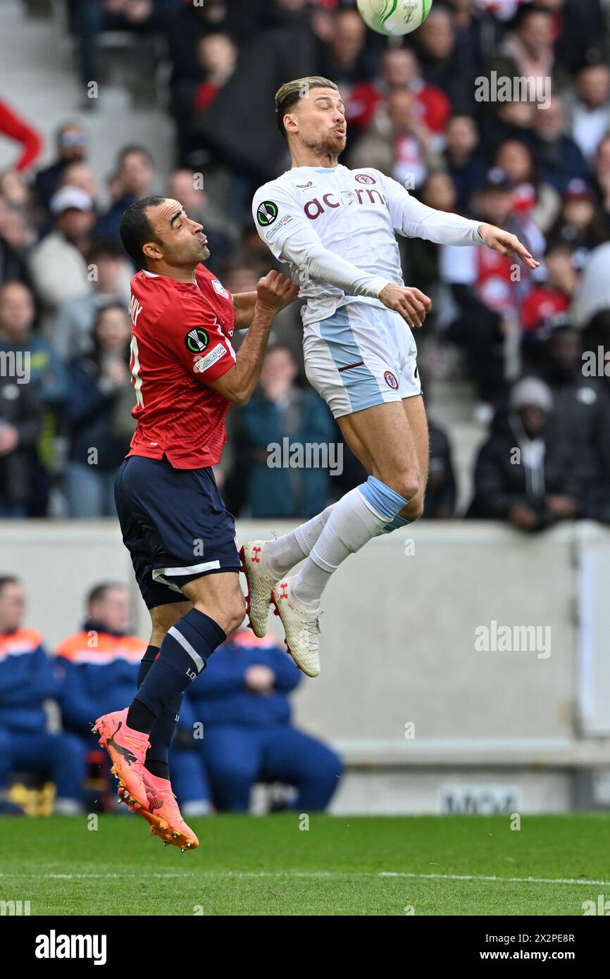 Lille, France. 18th Apr, 2024. Ismaily (31) of Lille and Matty Cash (2) of Aston Villa pictured ...