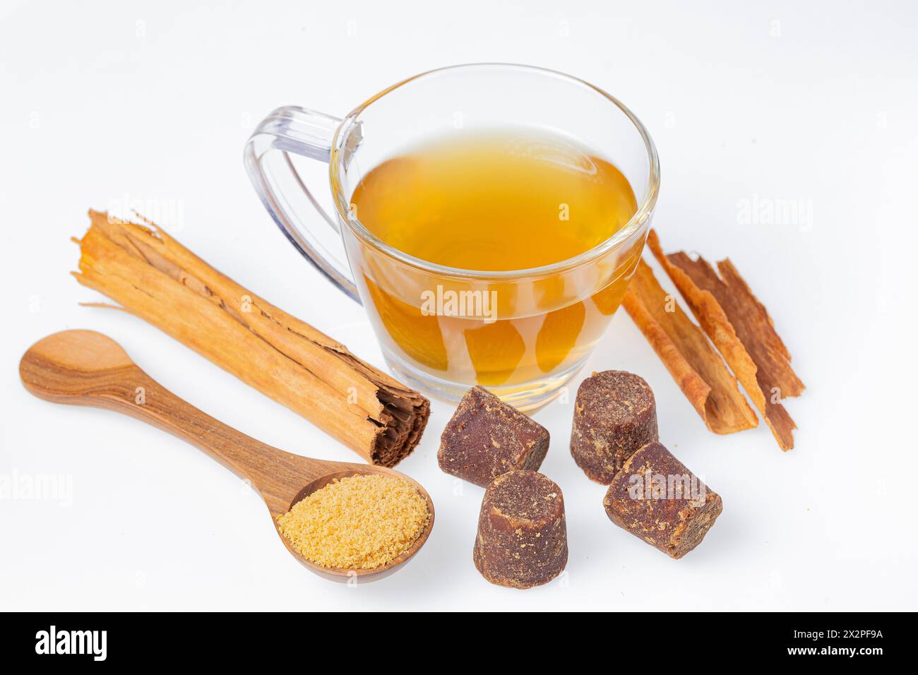 Piloncillo, ground piloncillo and piloncillo tea isolated on white ...