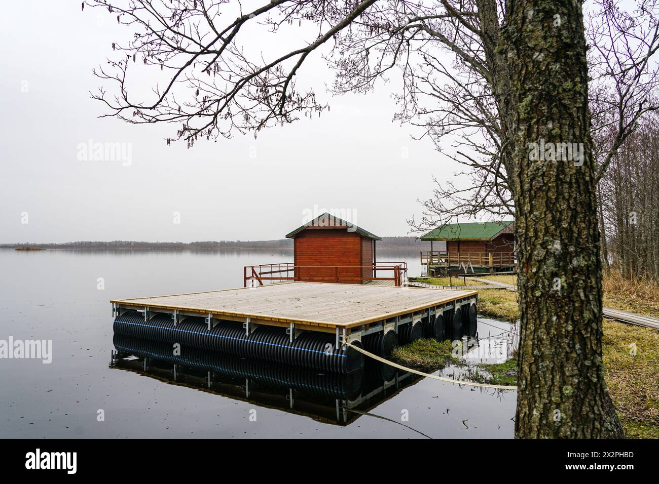 Large floating wooden platforms on pontoons with holiday houses in the ...