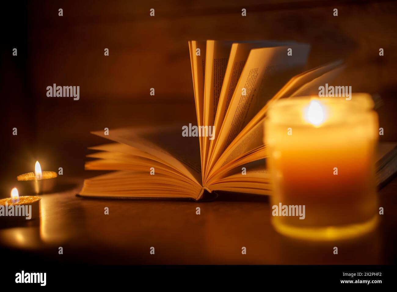 Candlelight book hi-res stock photography and images - Alamy