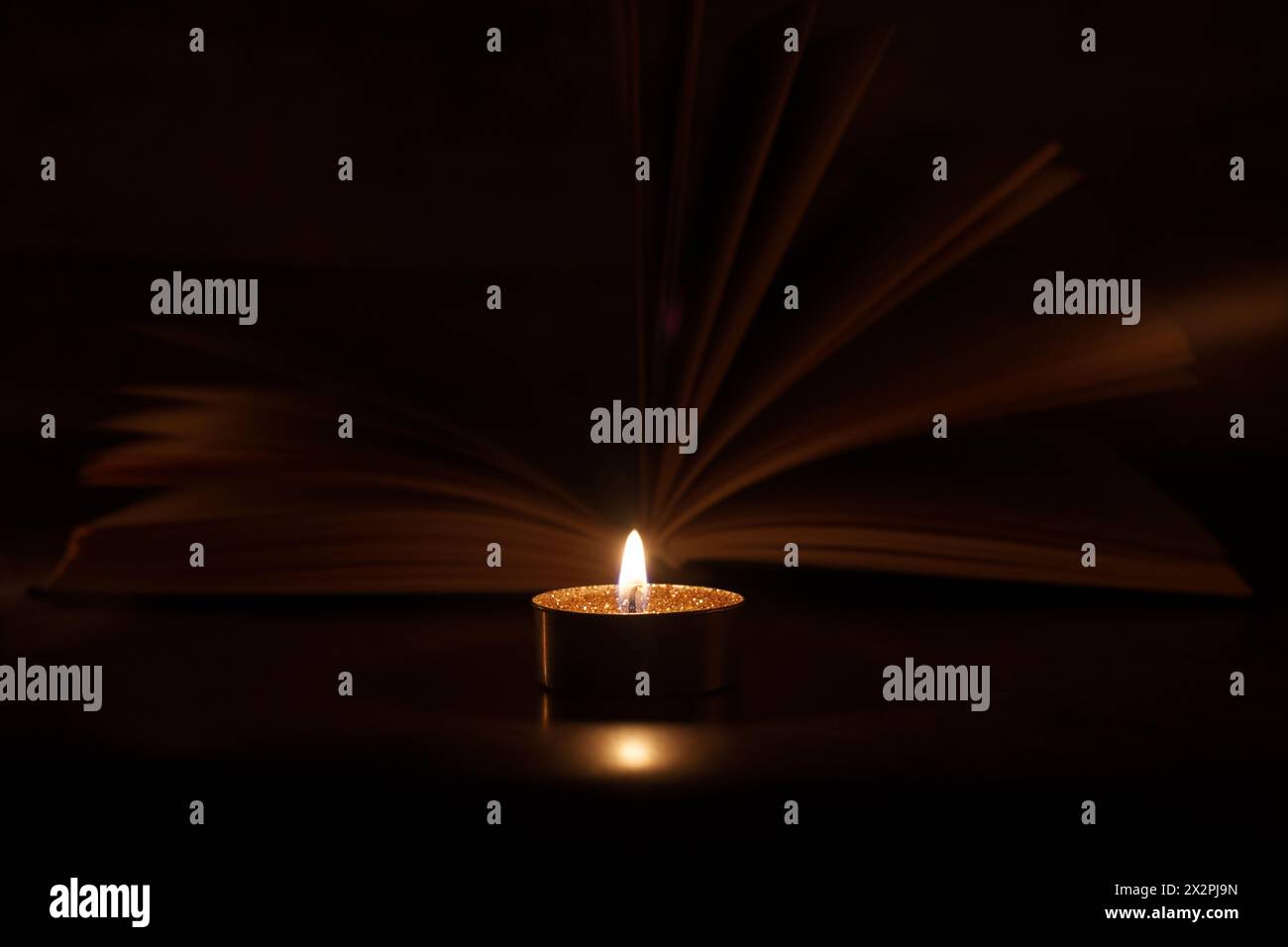 Candlelight book hi-res stock photography and images - Alamy