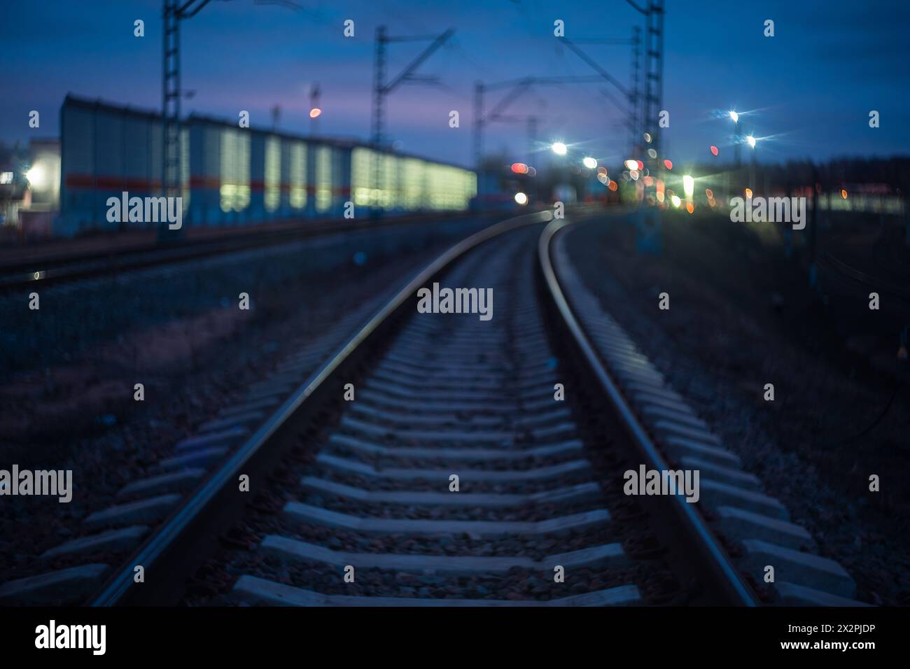 Railway in the night Stock Photo - Alamy