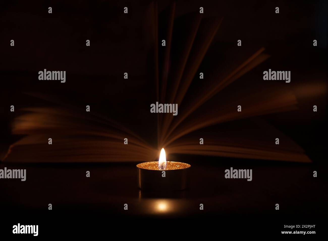 Bible by candlelight hi-res stock photography and images - Alamy