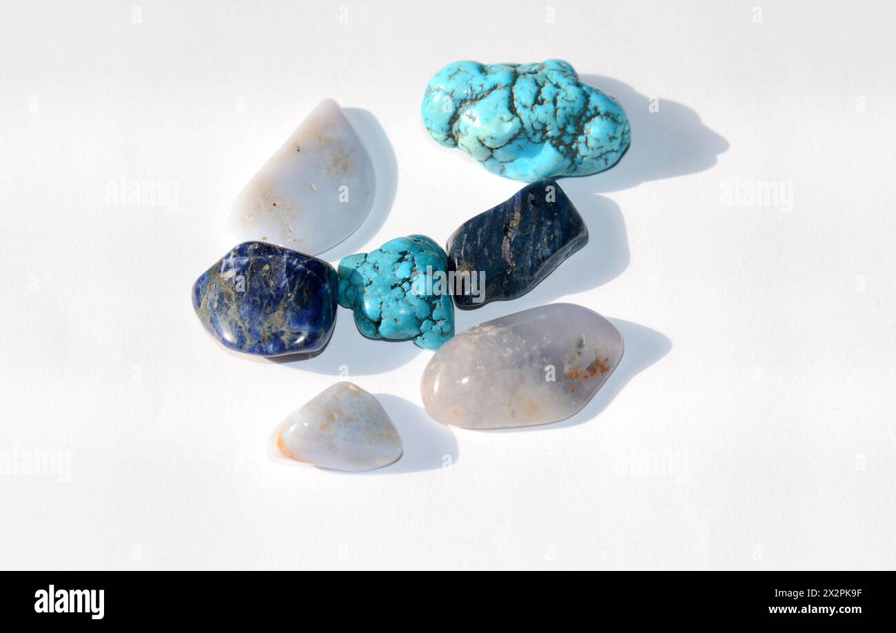 collection of various blue raw mineral gemstones showcasing natural ...