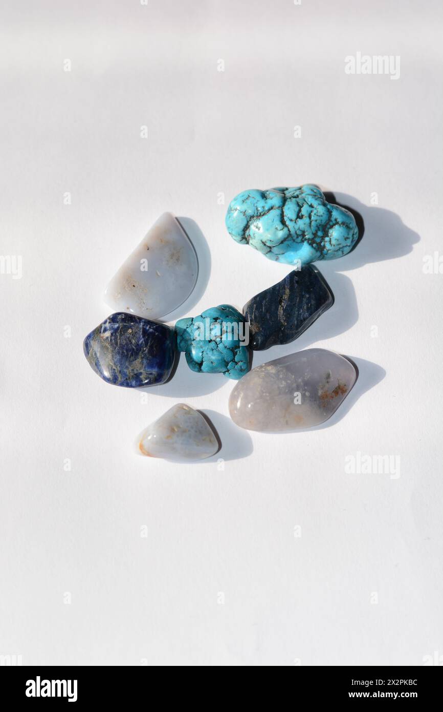 collection of various blue raw mineral gemstones showcasing natural ...