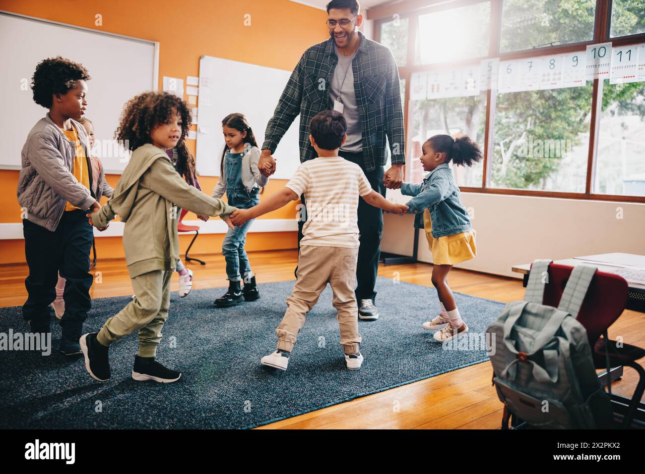 Group school children playing classroom hi-res stock photography and ...