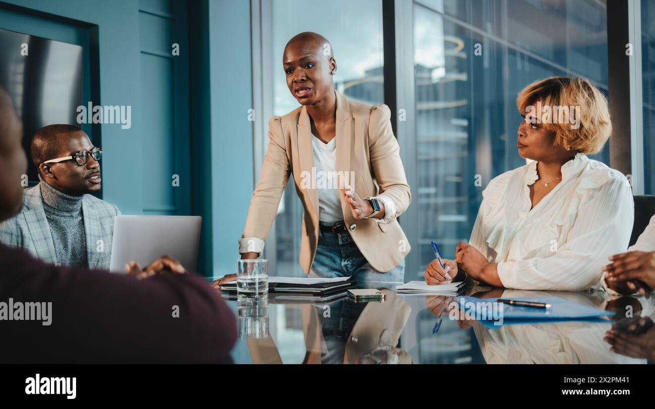 Team of business people having a business meeting within a modern ...