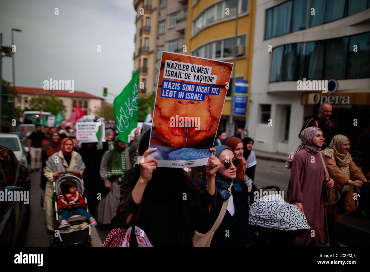 Istanbul, Turkey. 23rd Apr, 2024. A protester holds a placard ...
