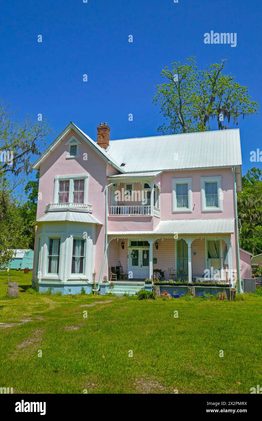 Old house in a North Florida small town is painted an eye-catching pink ...