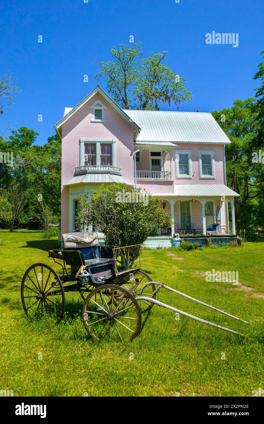 Old house in a North Florida small town is painted an eye-catching pink ...