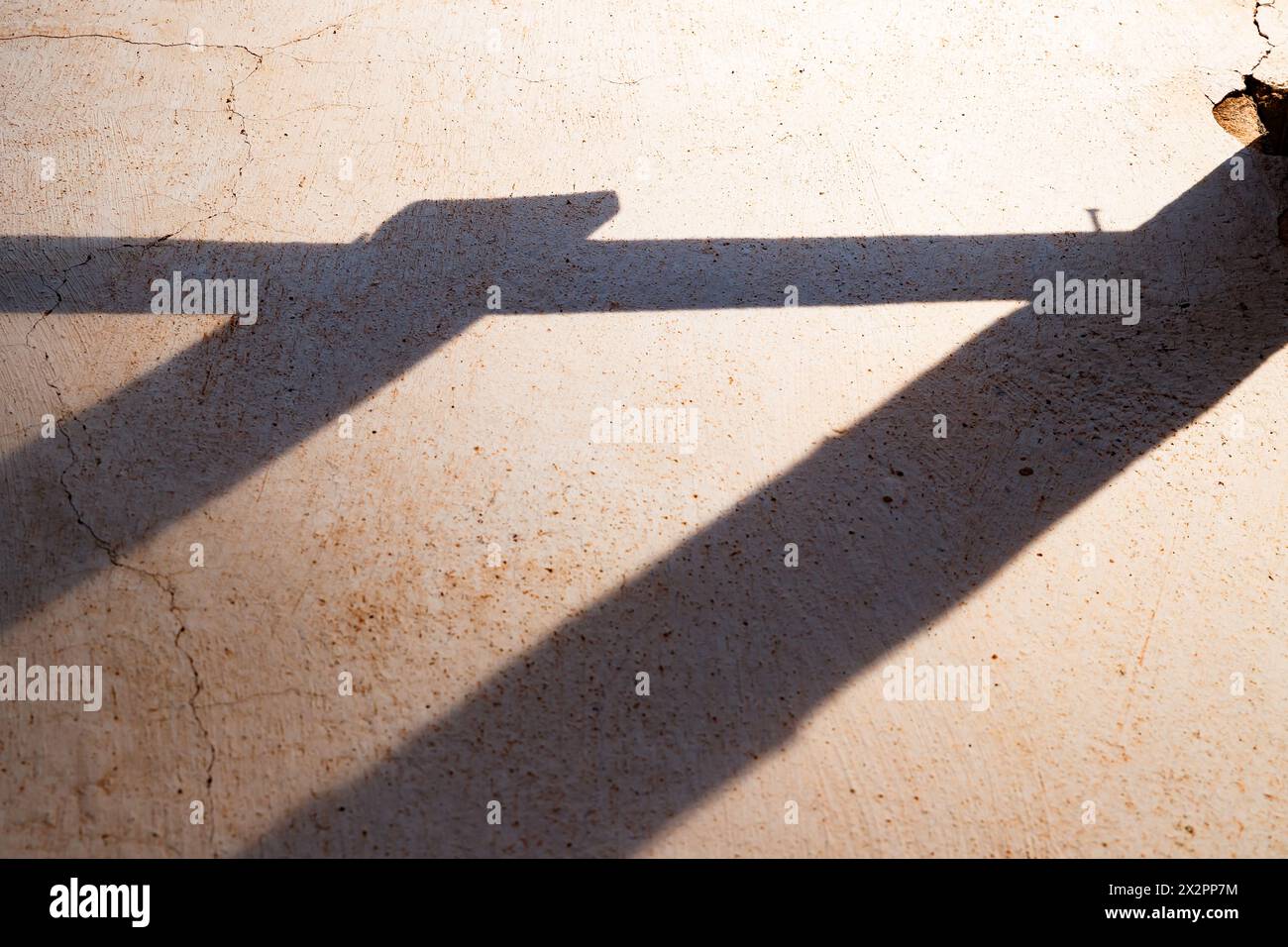 Shadows of beams on the facade in Sella Stock Photo - Alamy