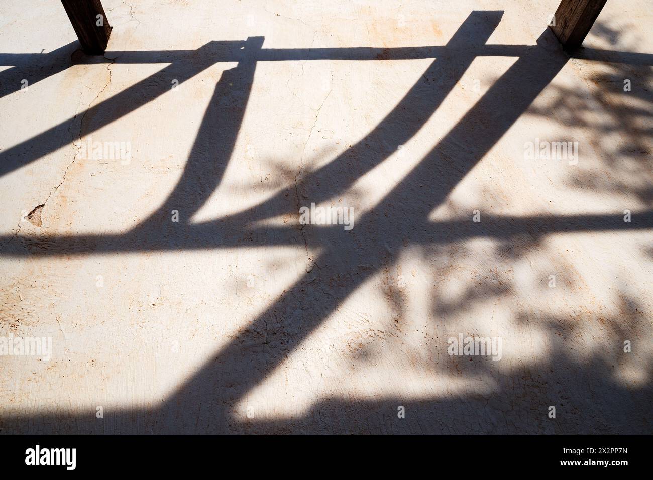 Shadows of beams on the facade in Sella Stock Photo - Alamy