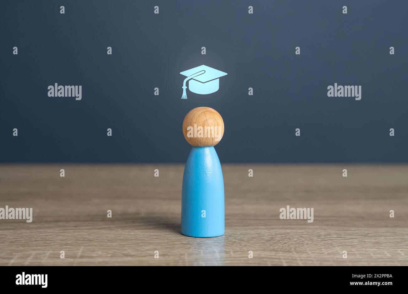 A man with a graduate cap symbol, the concept of getting an education ...