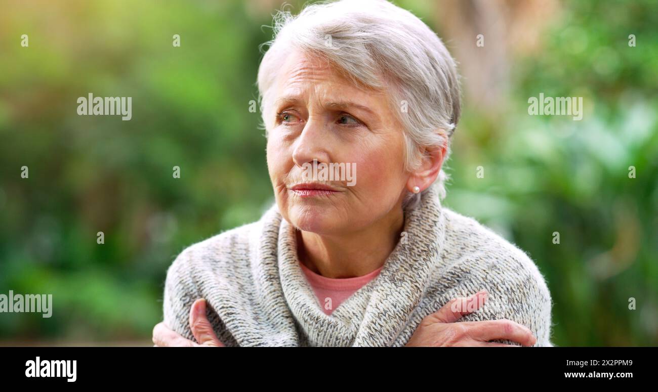 Senior woman, thinking and lonely in park for retirement, pension and ...