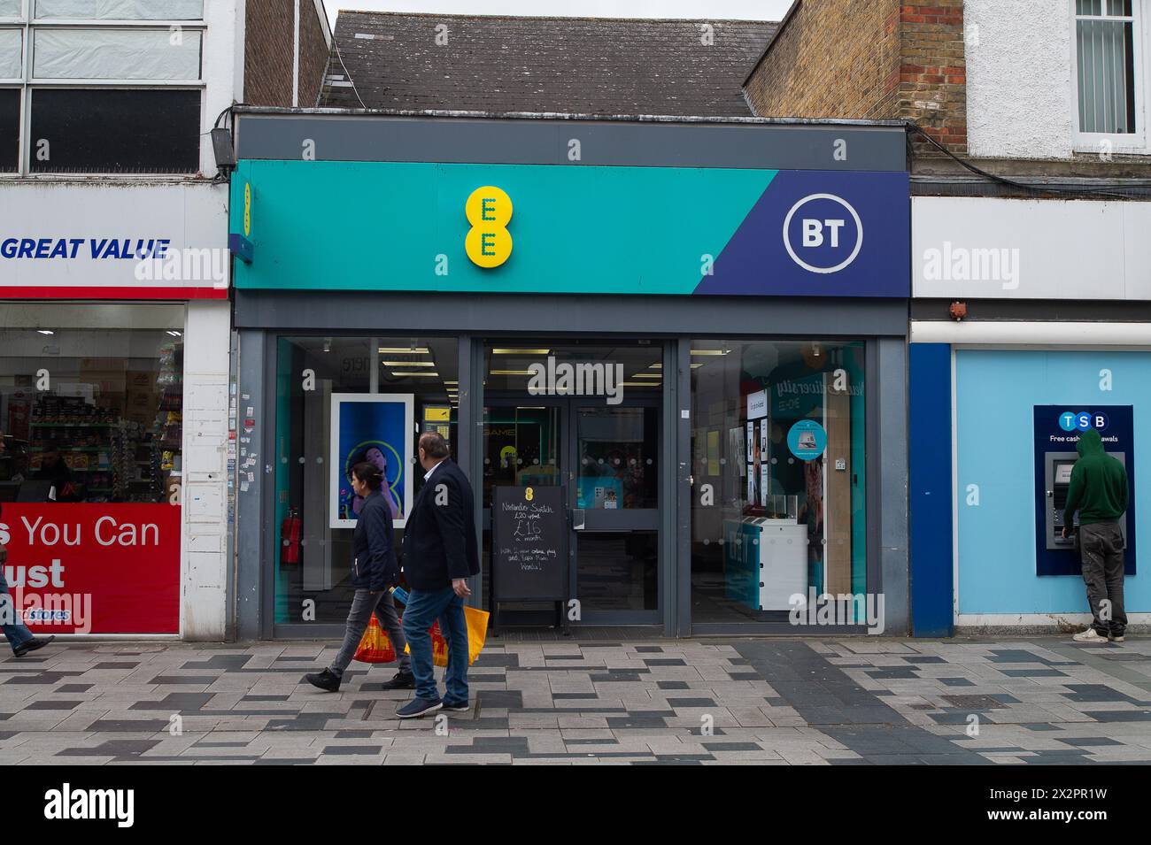 Slough, Berkshire, UK. 19th April, 2024. An EE and BT mobile phone ...