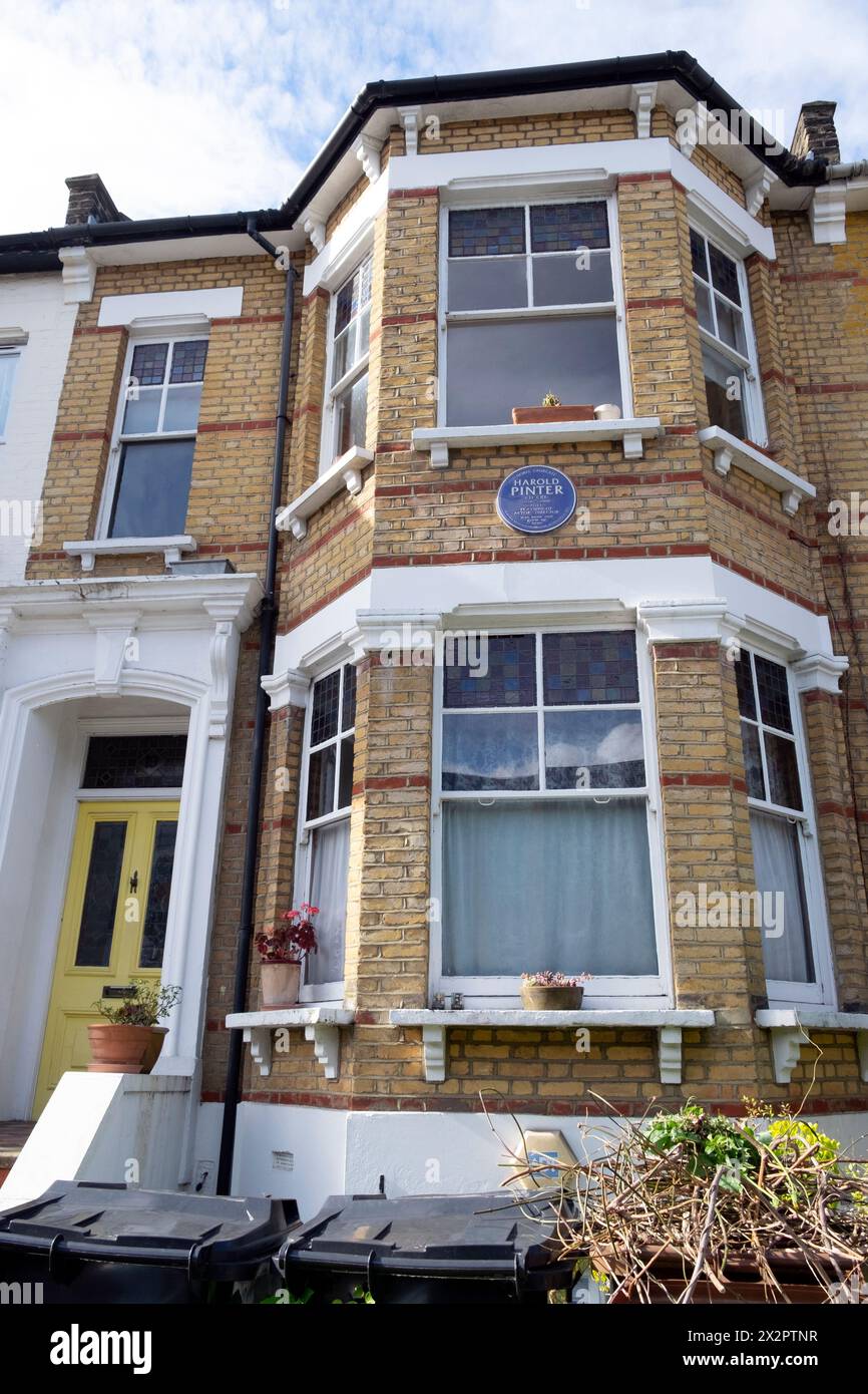 Exterior vertical view of brick house and blue plaque on 19 ...