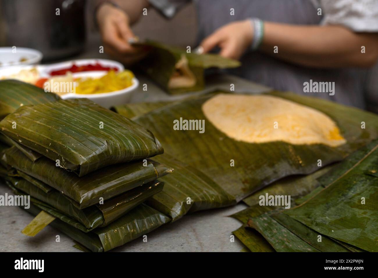 wrap a Hallaca or tamale in banana leaf Stock Photo - Alamy