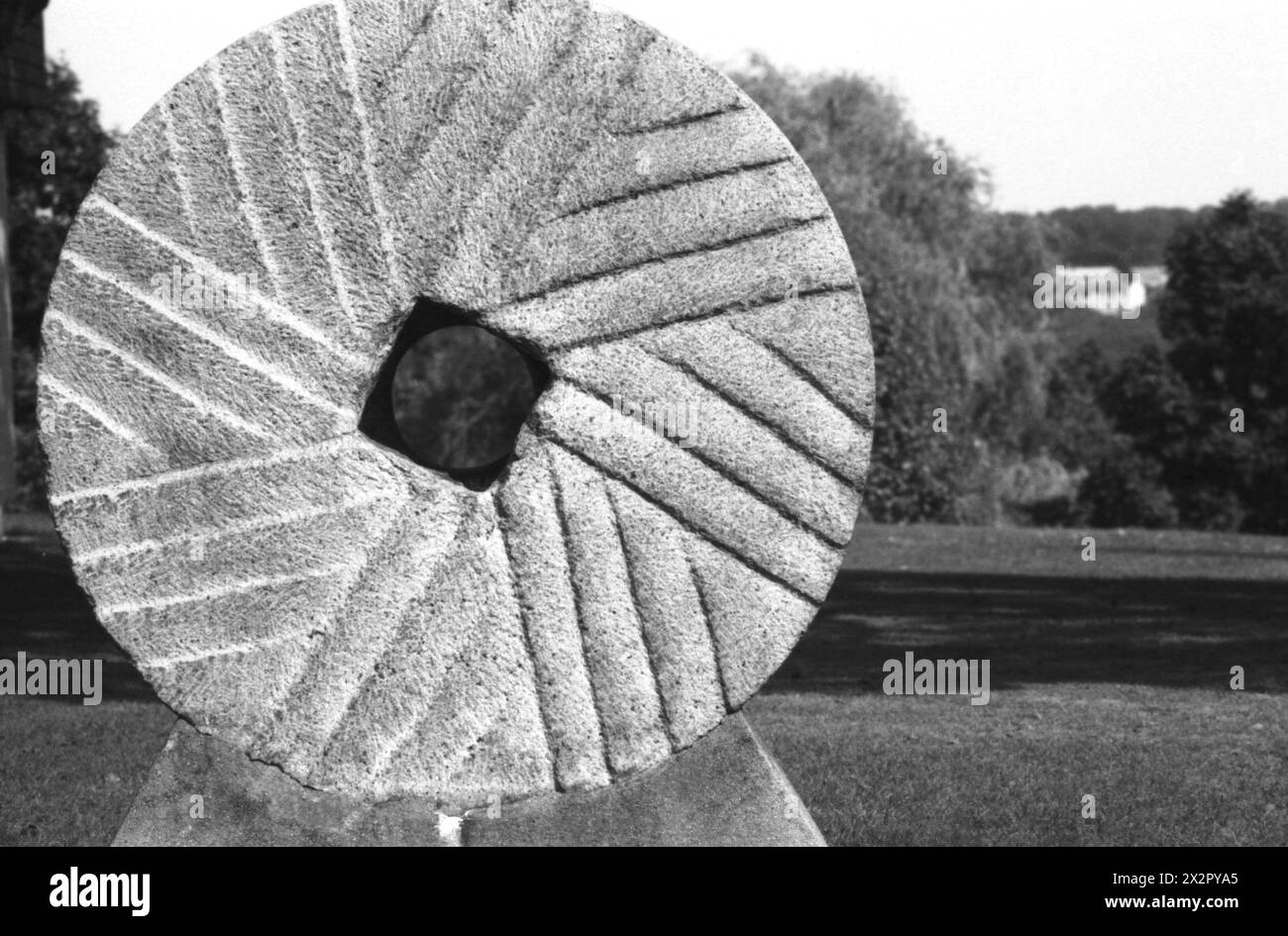 Stratford, Connecticut, U.S.A., 1982. Old millstone displayed at Boothe ...