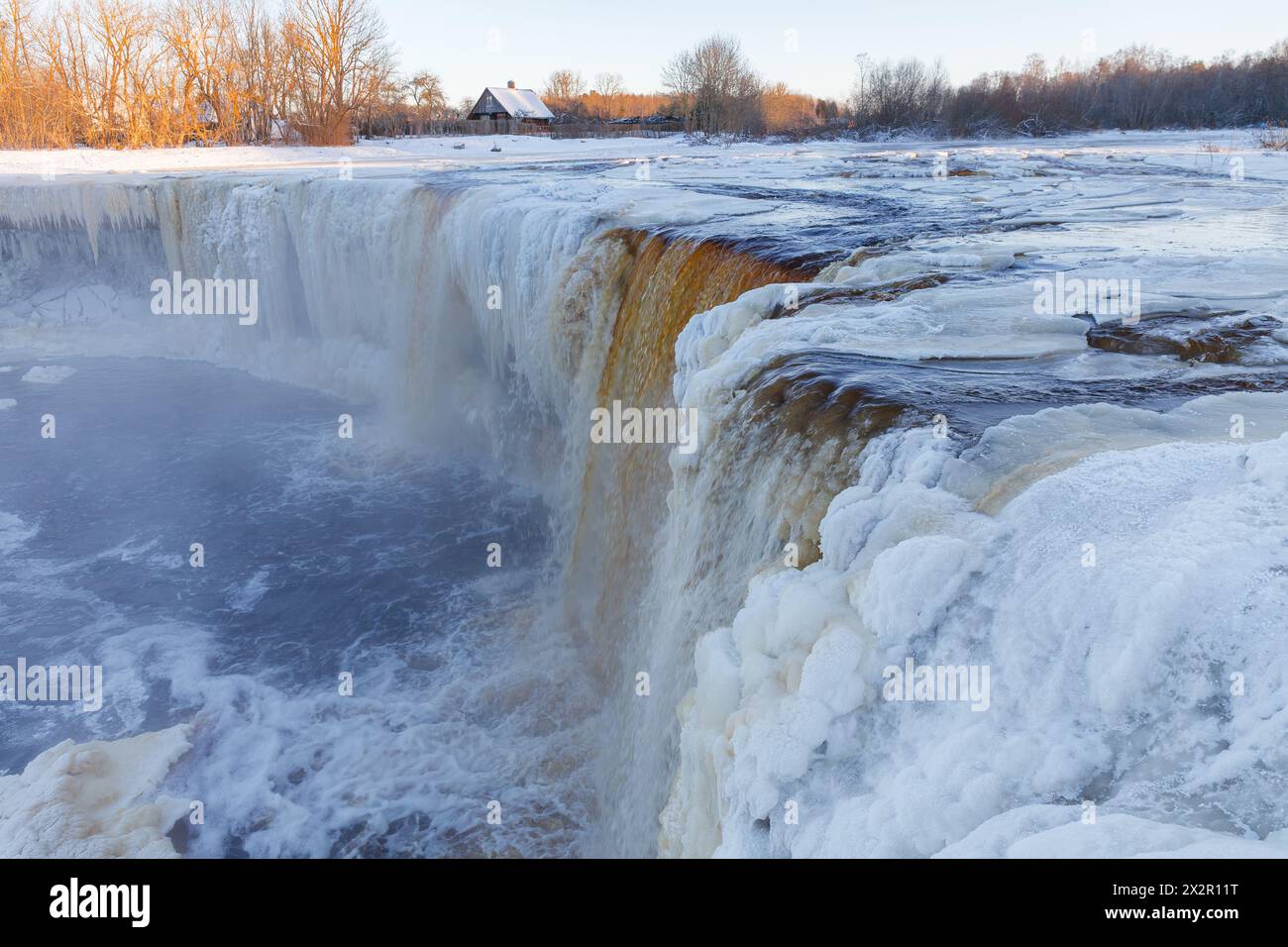 Partially frozen waterfall Jagala juga, Estonia. Water falling from ...
