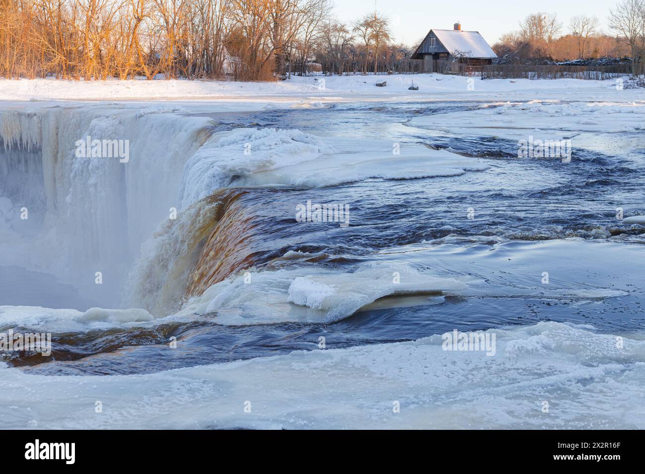 Partially frozen waterfall Jagala juga, Estonia. Water falling from ...