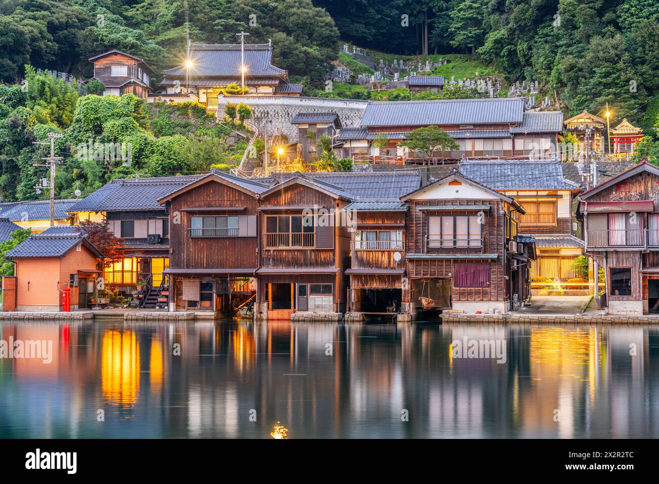 Kyoto, Japan at Ine Bay historic funaya boathouses at dusk Stock Photo ...