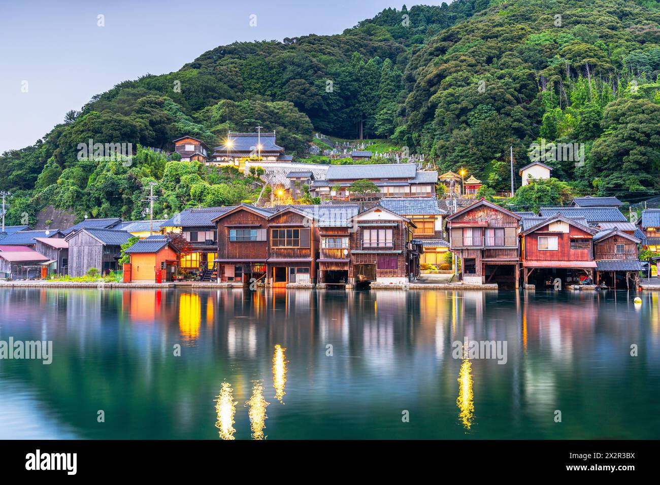 Kyoto, Japan at Ine Bay historic funaya boathouses at dusk Stock Photo ...