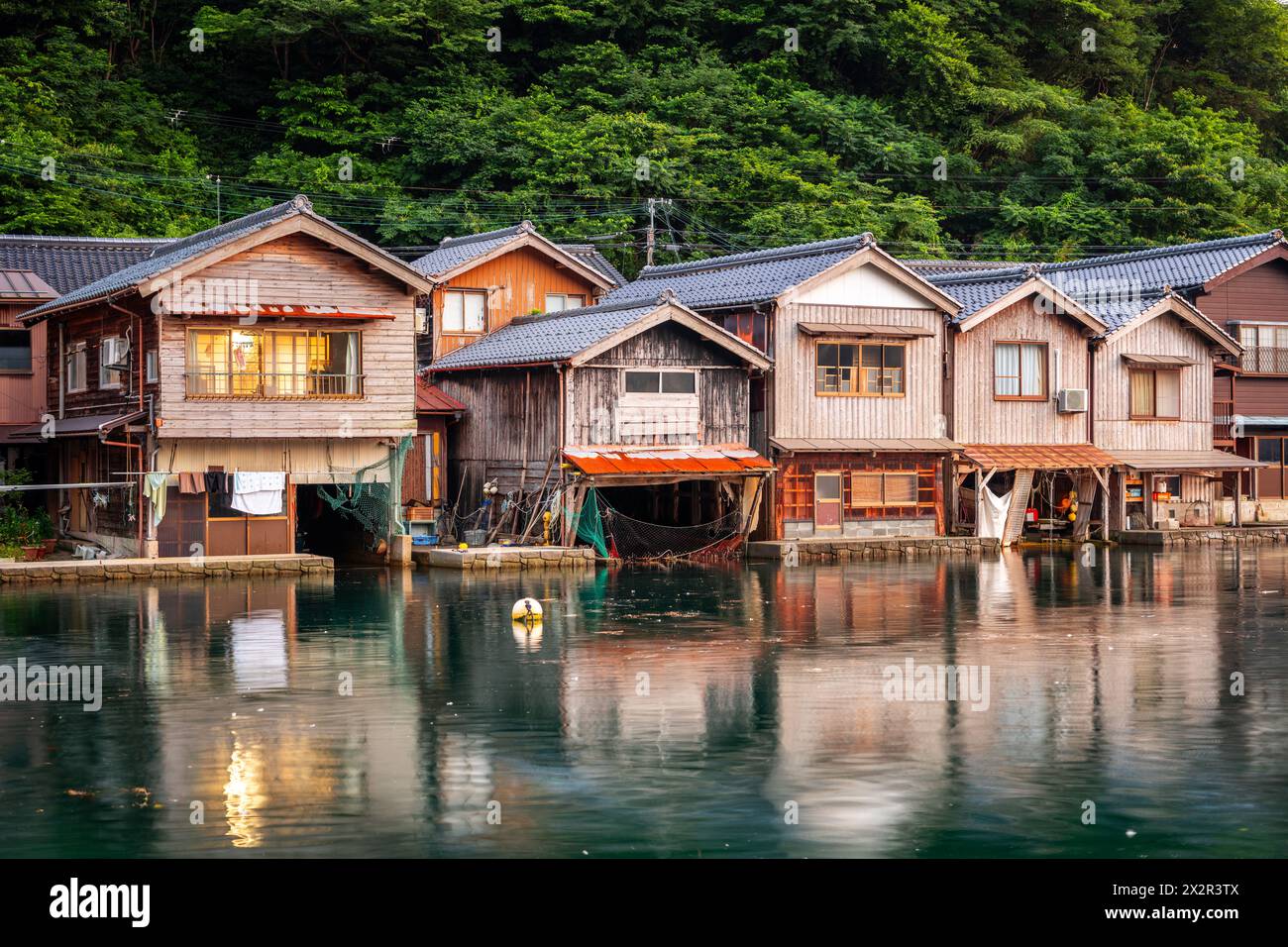 Kyoto, Japan at Ine Bay historic funaya boathouses at dusk Stock Photo ...
