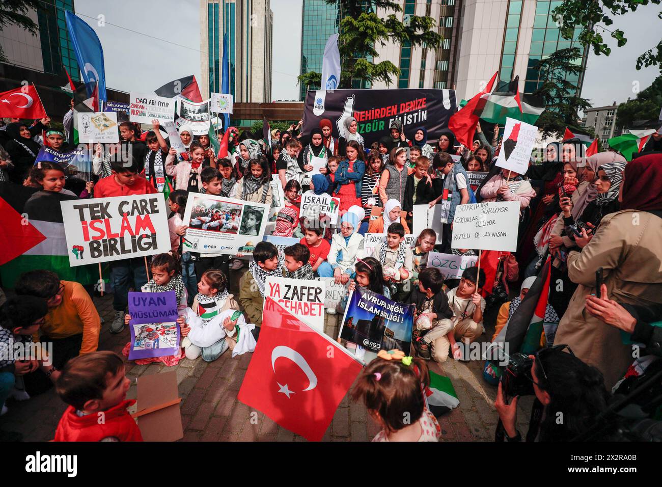 Istanbul, Turkey. 23rd Apr, 2024. Turkish and Arab children hold flags ...