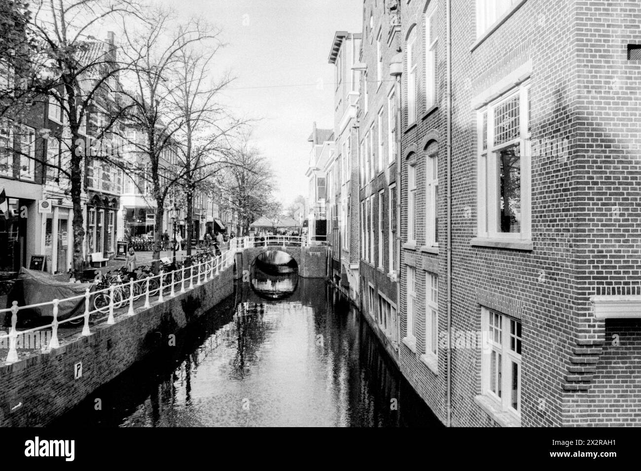 Ancient Canals View on one of the many down town canals of Delft, a ...