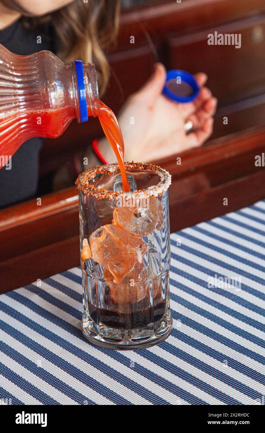 Preparing to taste a delicious bloody mary, to cool off in this hot ...