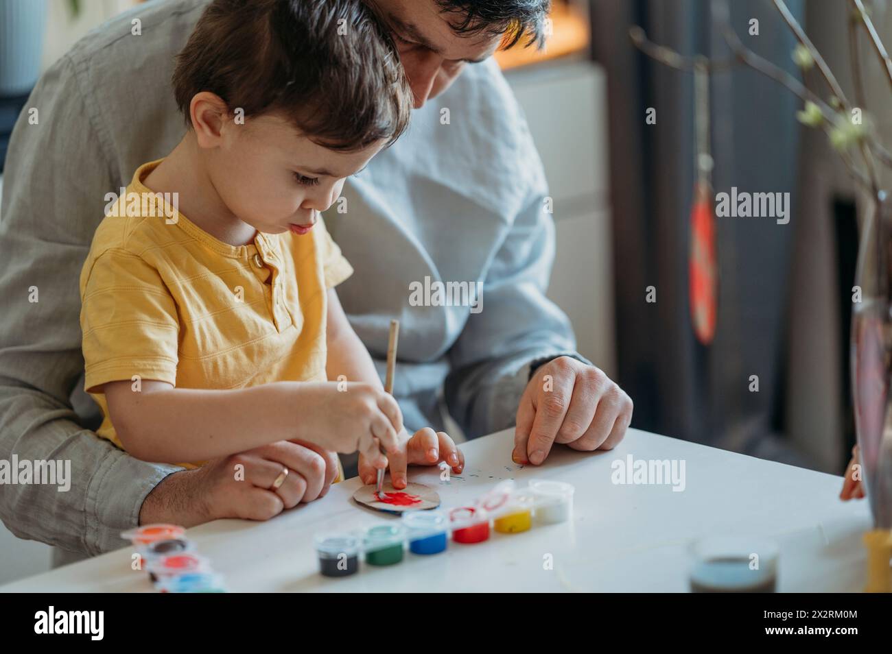 Father teaching son paint hi-res stock photography and images - Alamy