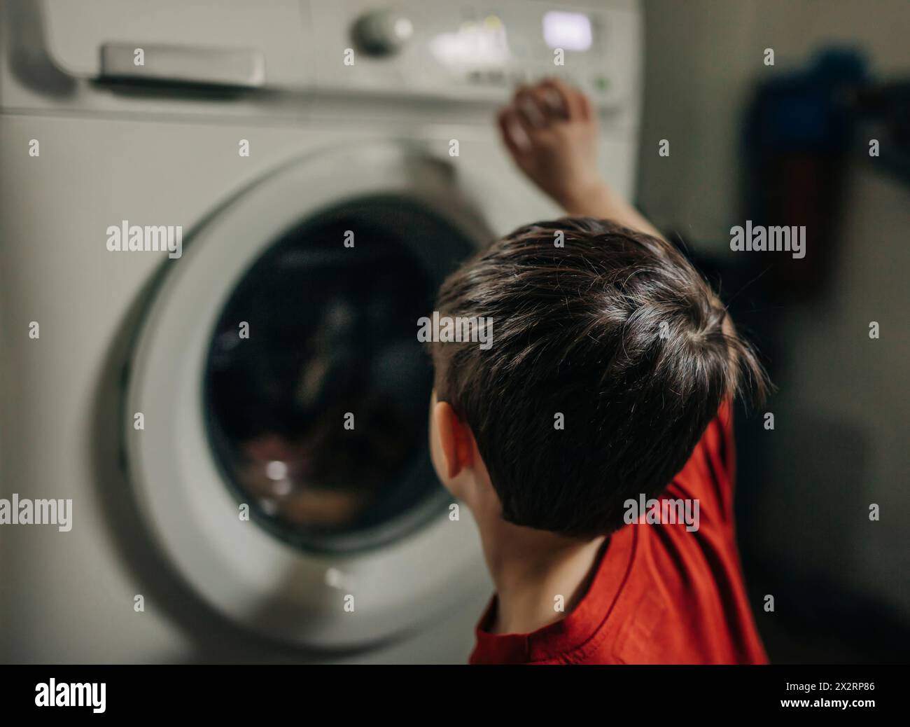 Child washing machine hi-res stock photography and images - Alamy